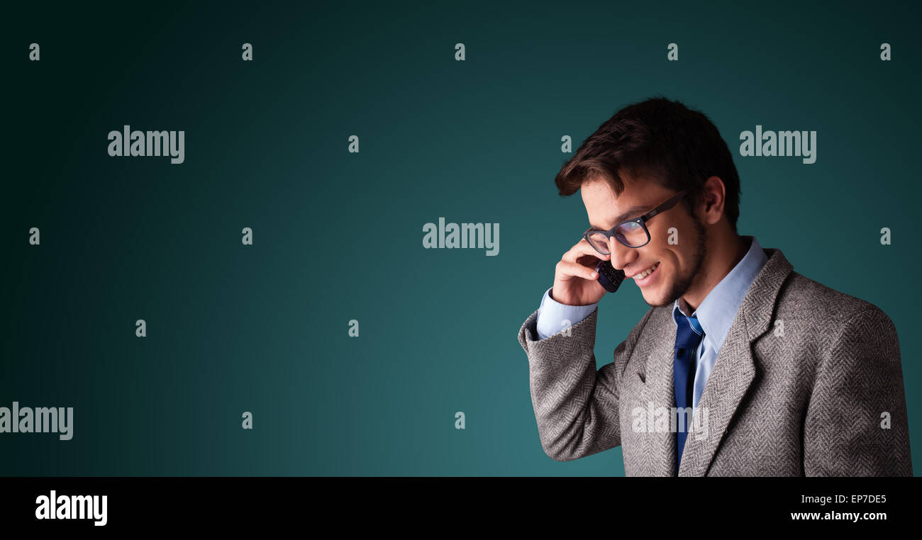 Young man making phone call with copy space Stock Photo - Alamy