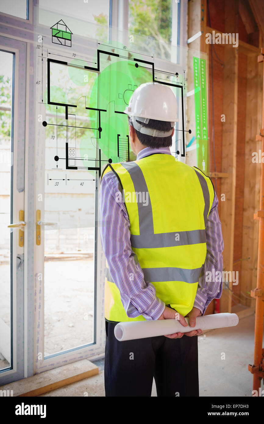 Architect looking at interface with house plan Stock Photo - Alamy