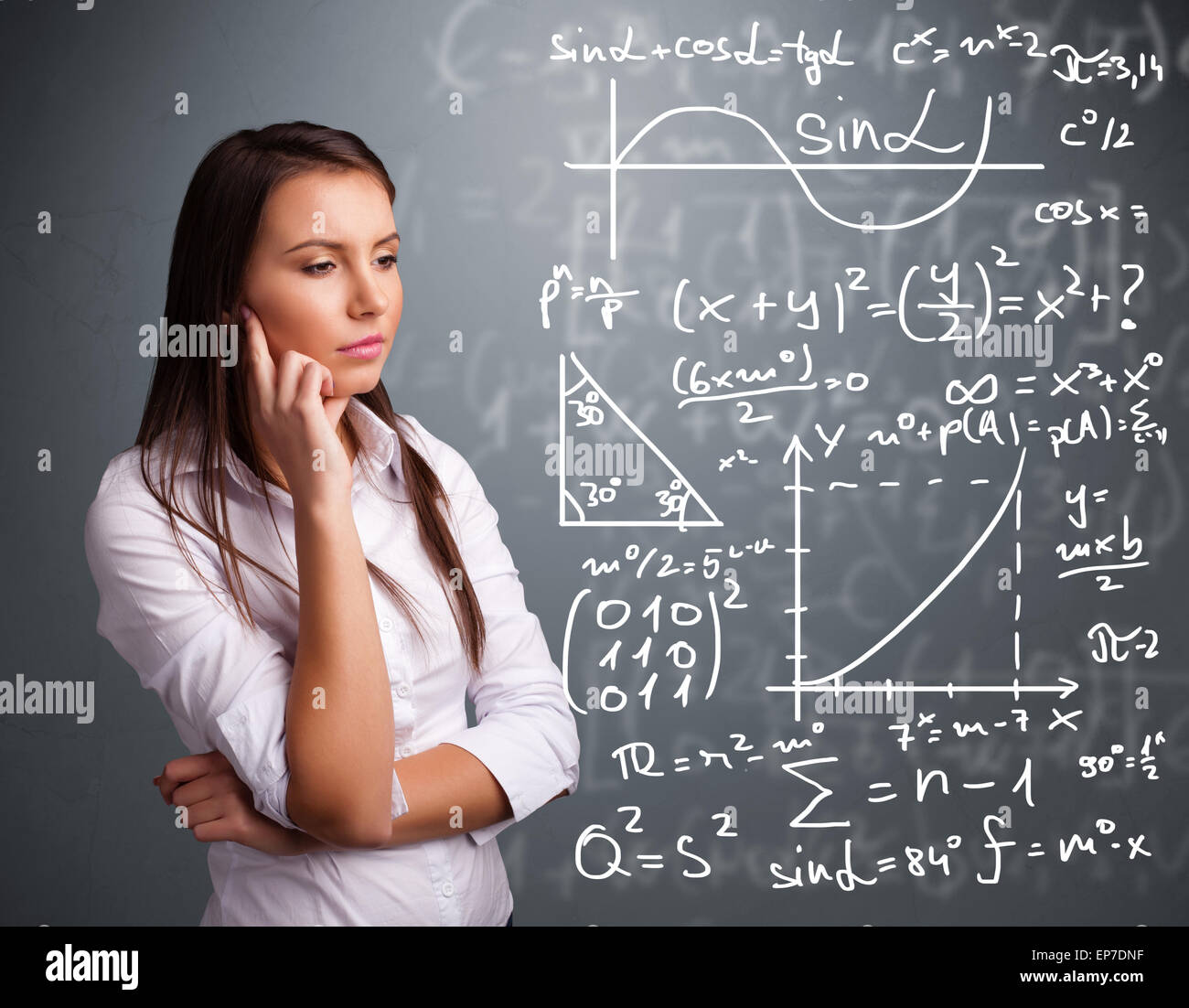 Beautiful school girl thinking about complex mathematical signs Stock ...