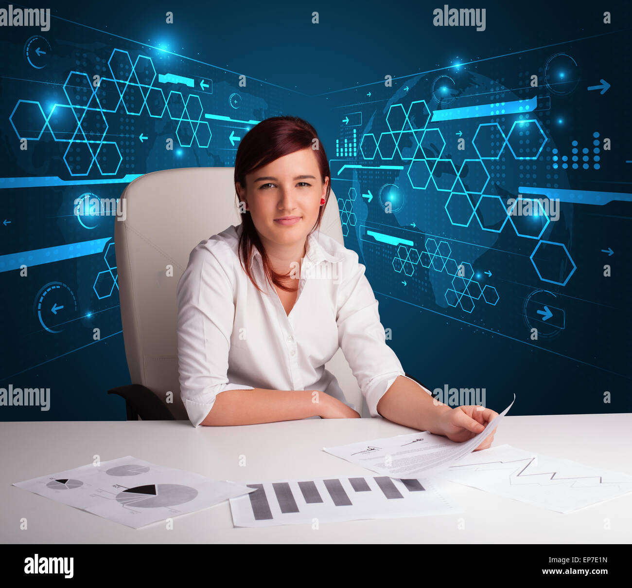 Businesswoman doing paperwork with futuristic background Stock Photo ...