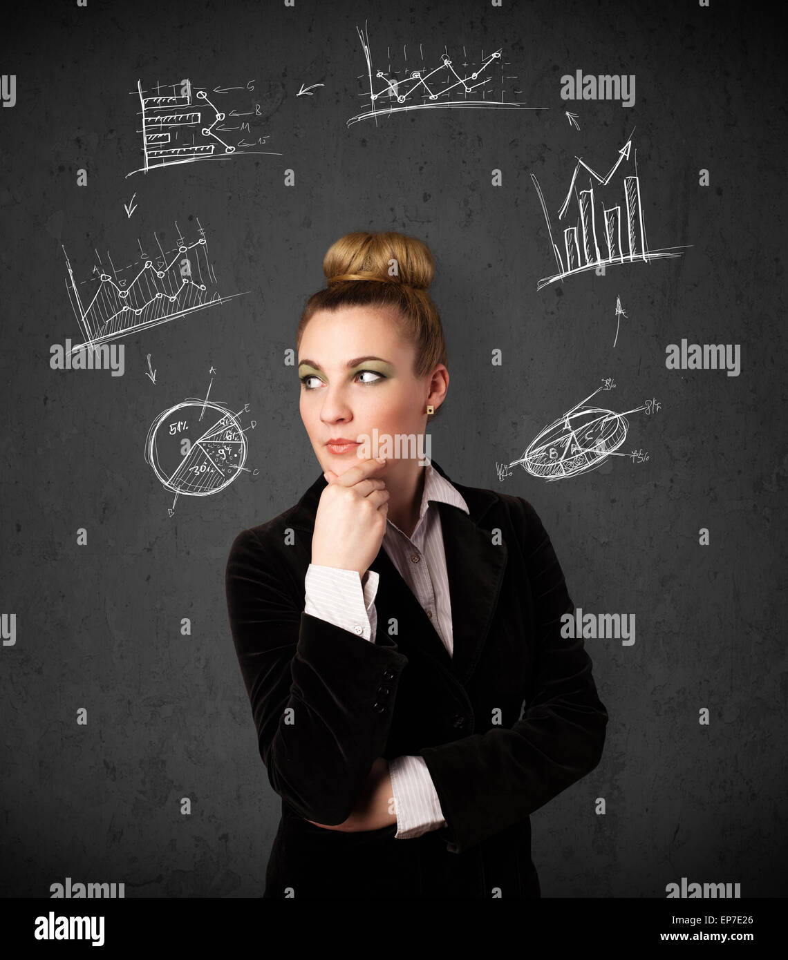 Young woman thinking with charts circulation around her head Stock ...