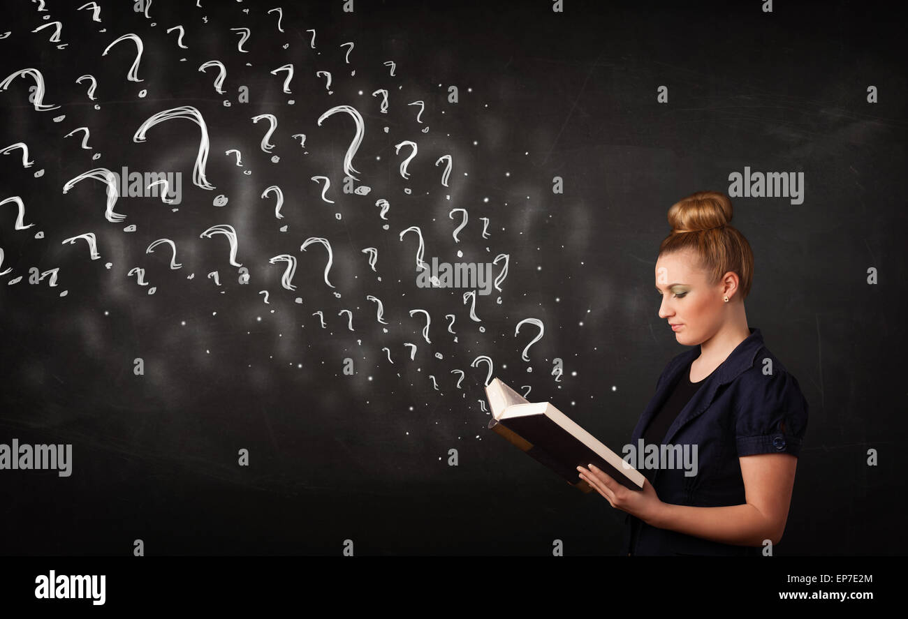 Pretty woman reading a book with question marks coming out from it ...