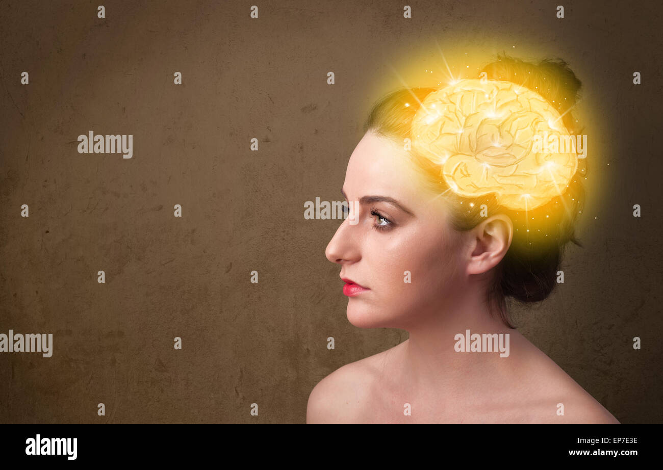 Young girl thinking with glowing brain illustration Stock Photo - Alamy