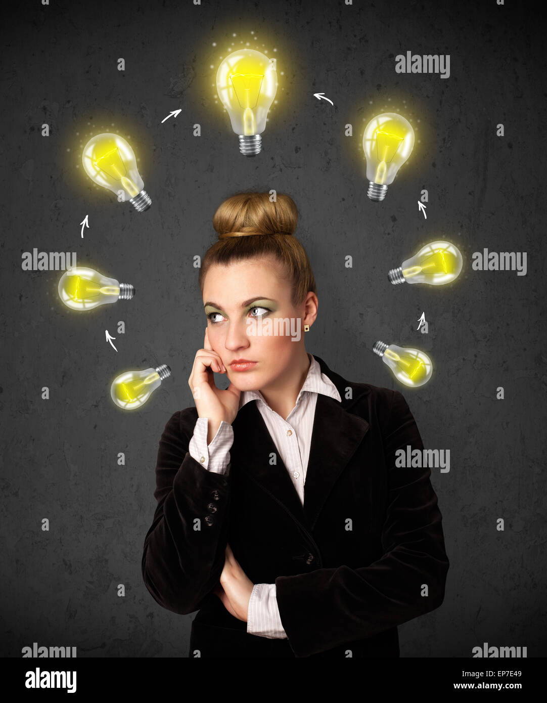 Young woman thinking with lightbulb circulation around her head Stock ...