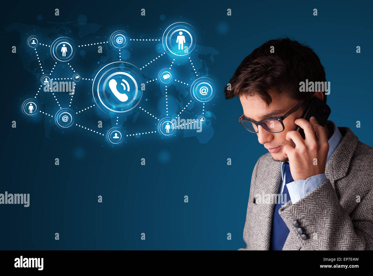 Young boy making phone call with social network icons Stock Photo - Alamy