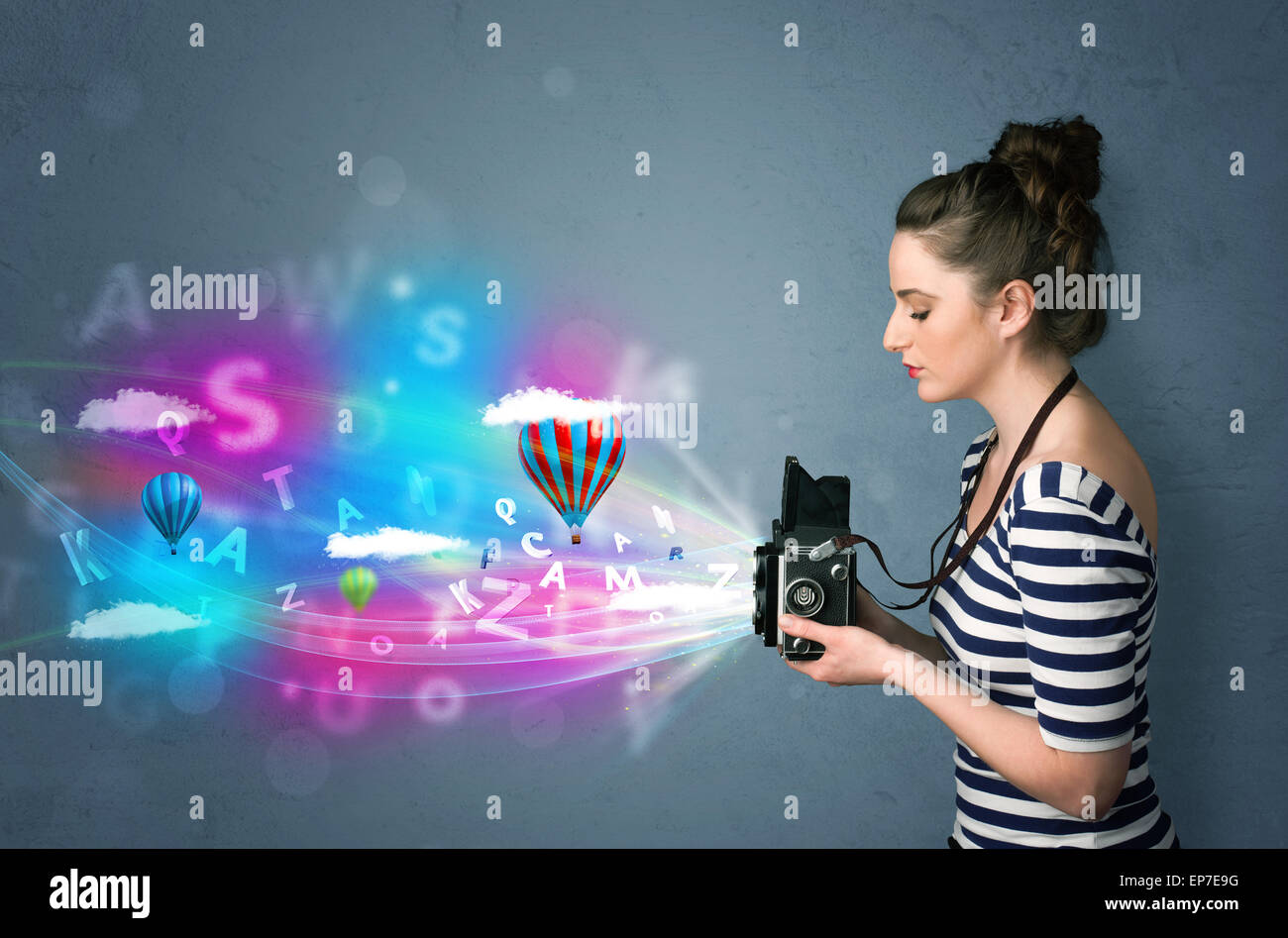 Photographer with camera and abstract imaginary Stock Photo - Alamy