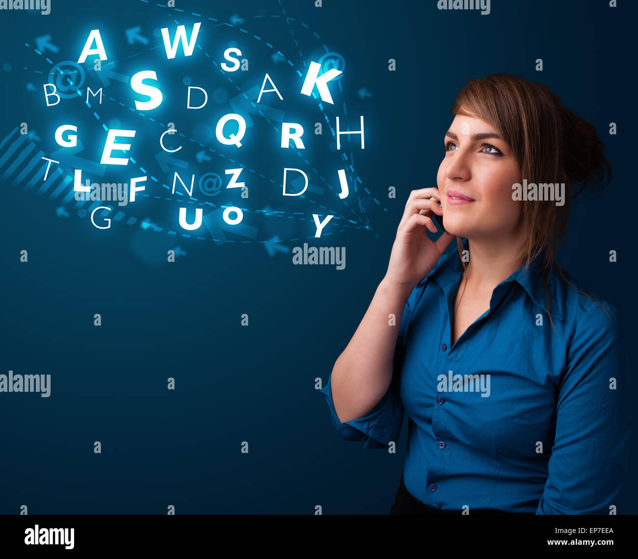 Young lady making phone call with shiny characters Stock Photo - Alamy