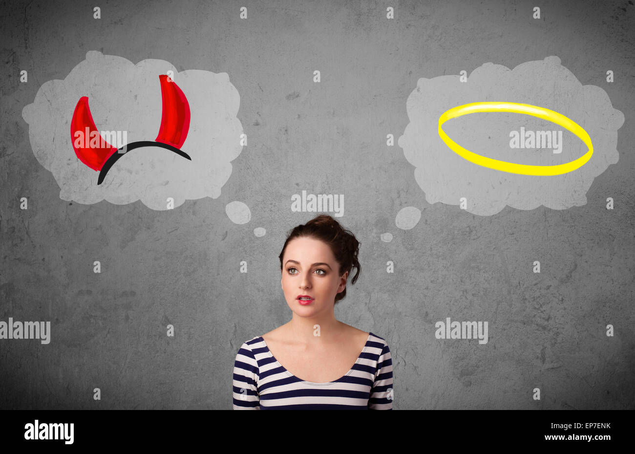 Woman choosing between good and bad Stock Photo - Alamy