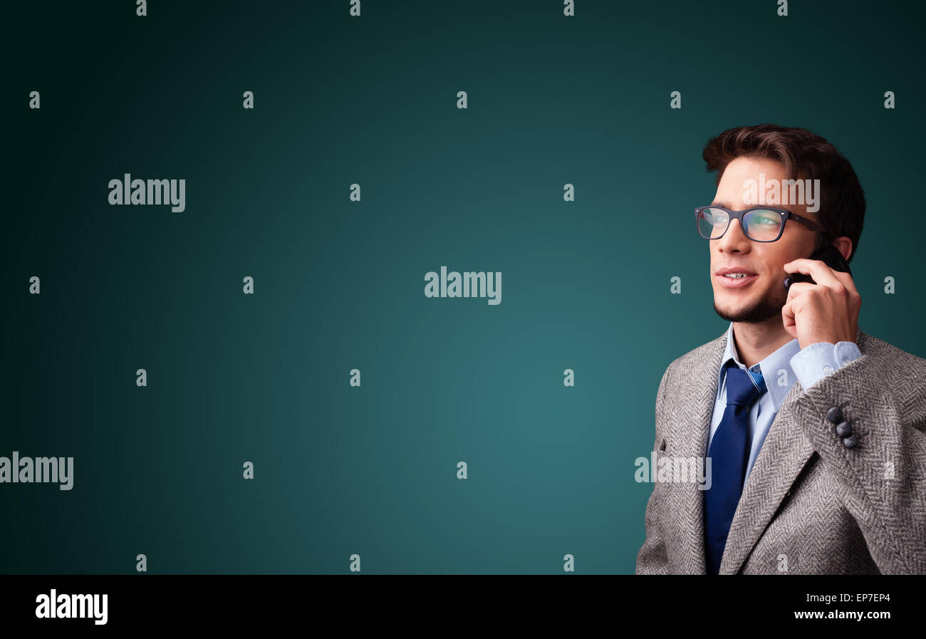 Young man making phone call with copy space Stock Photo - Alamy