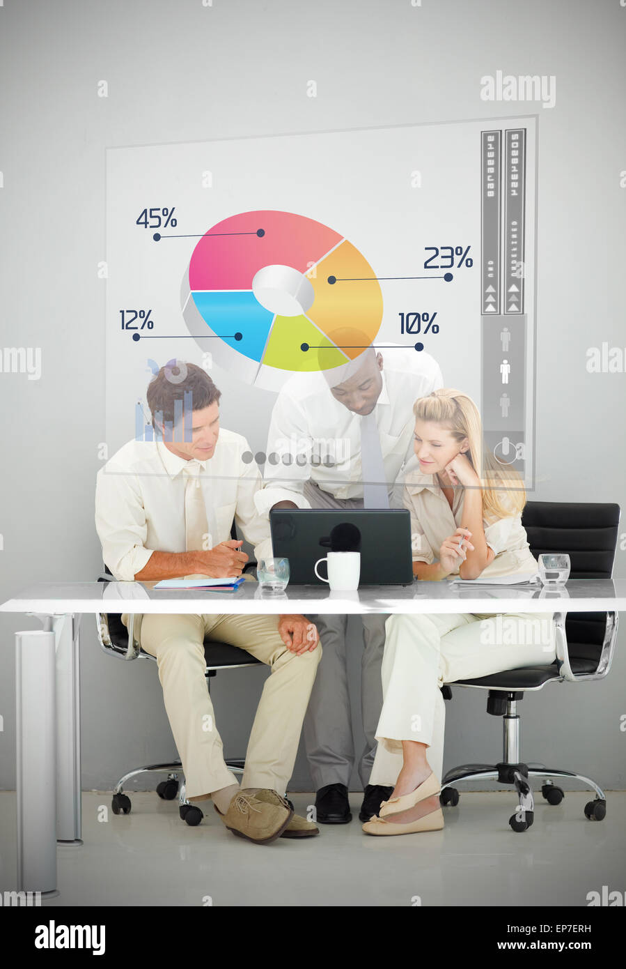 Three business people using colorful pie chart interface Stock Photo ...