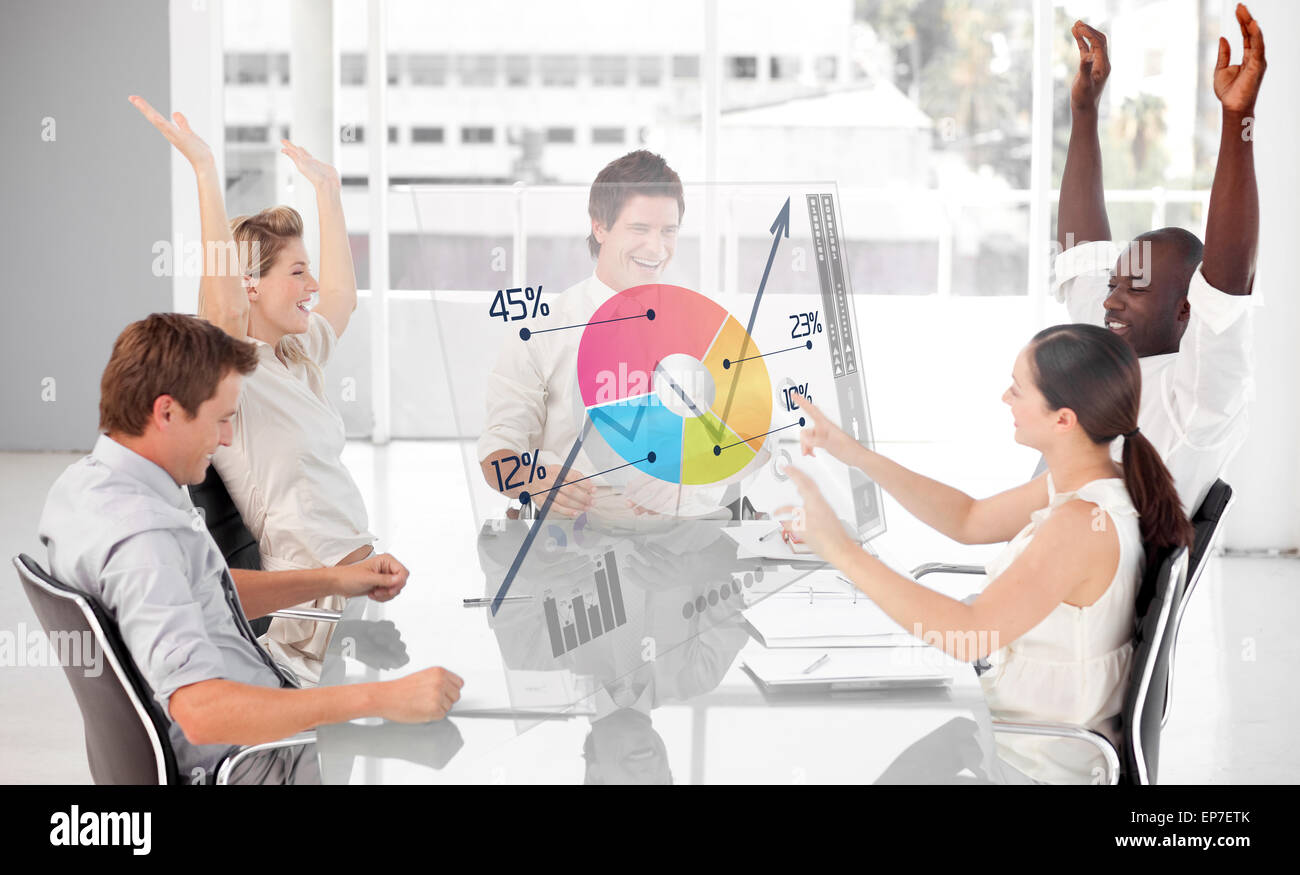 Cheerful business workers using colorful pie chart interface Stock ...