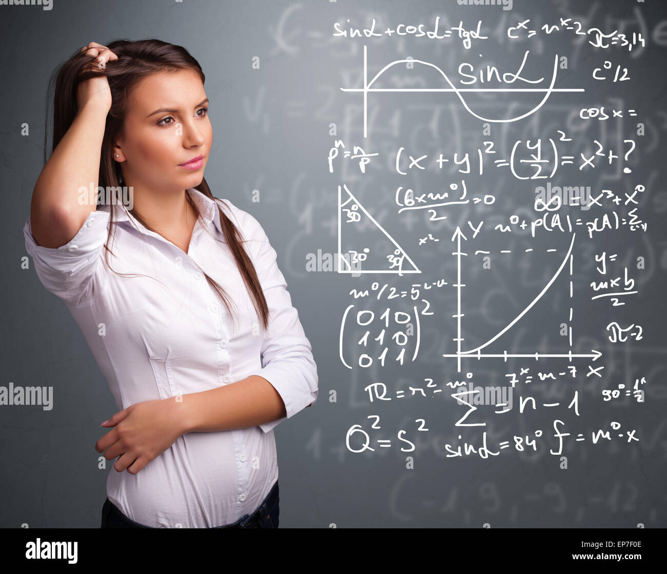Beautiful school girl thinking about complex mathematical signs Stock ...