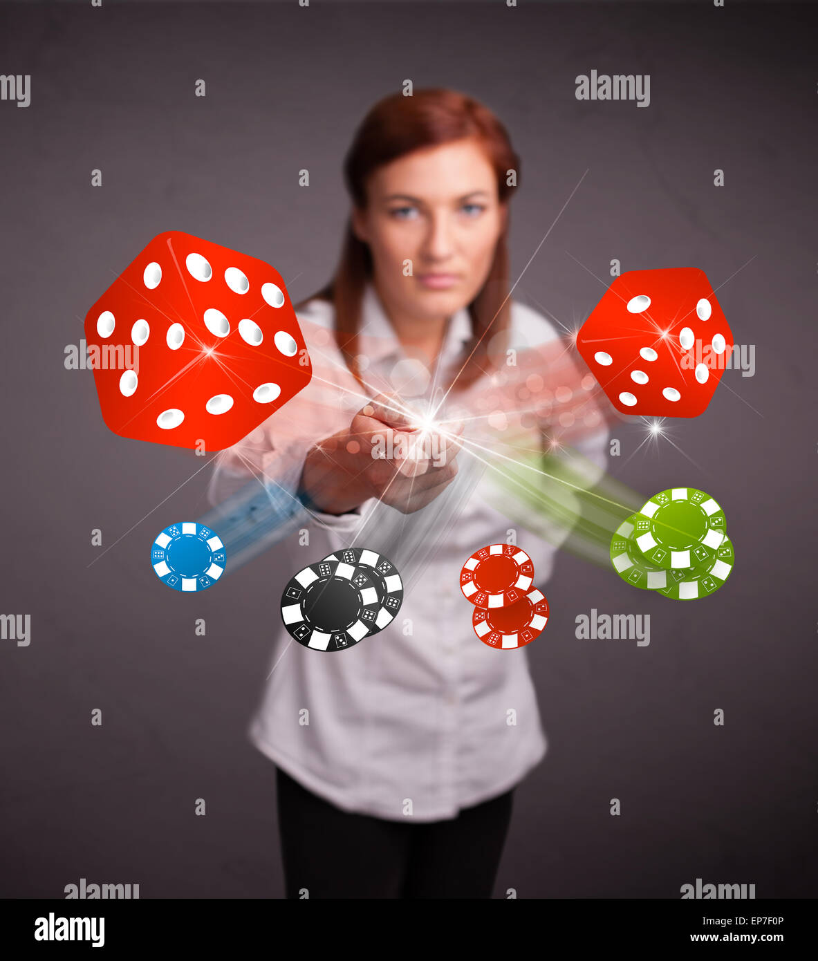 Young woman throwing dices and chips Stock Photo - Alamy