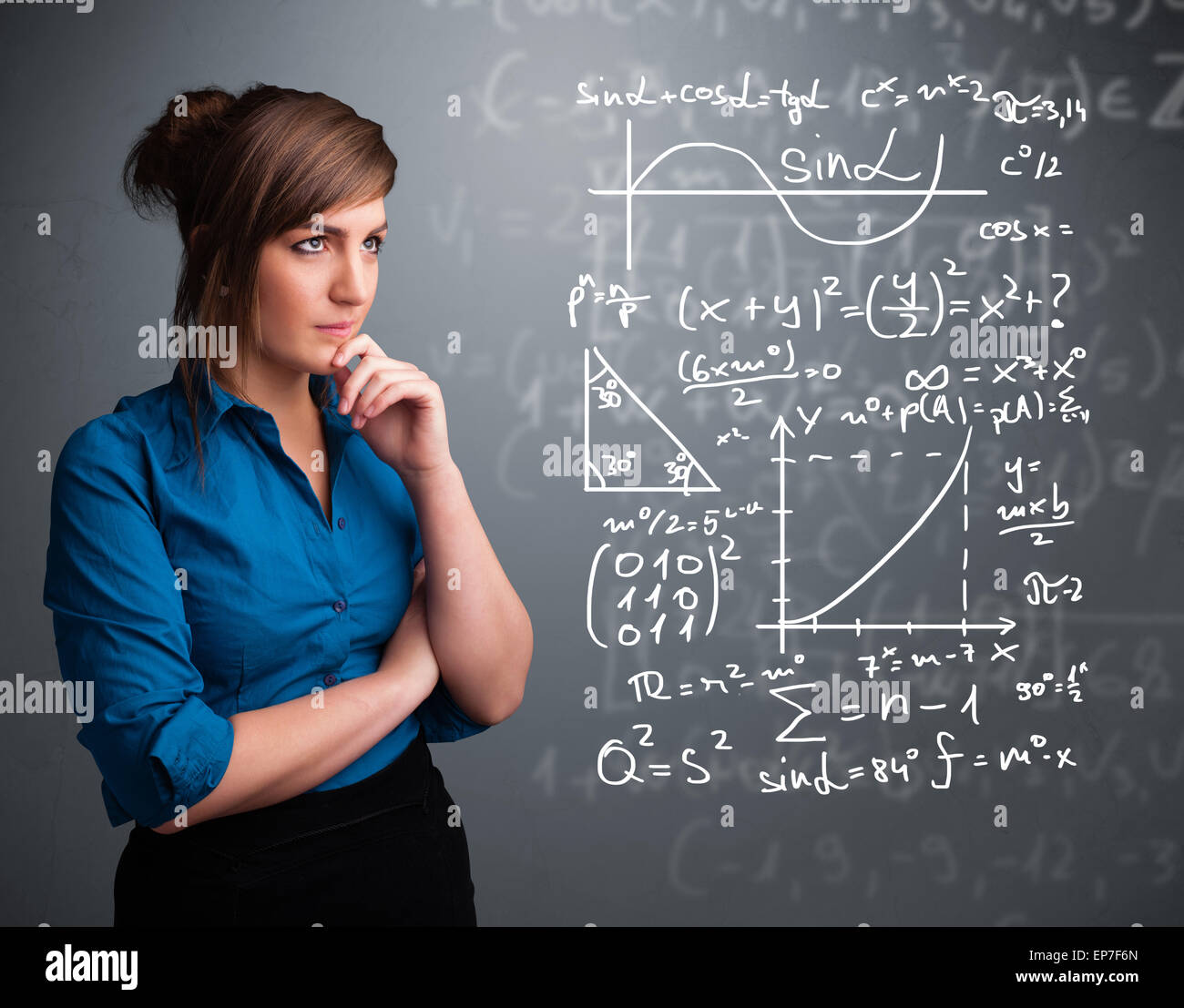 Beautiful school girl thinking about complex mathematical signs Stock ...