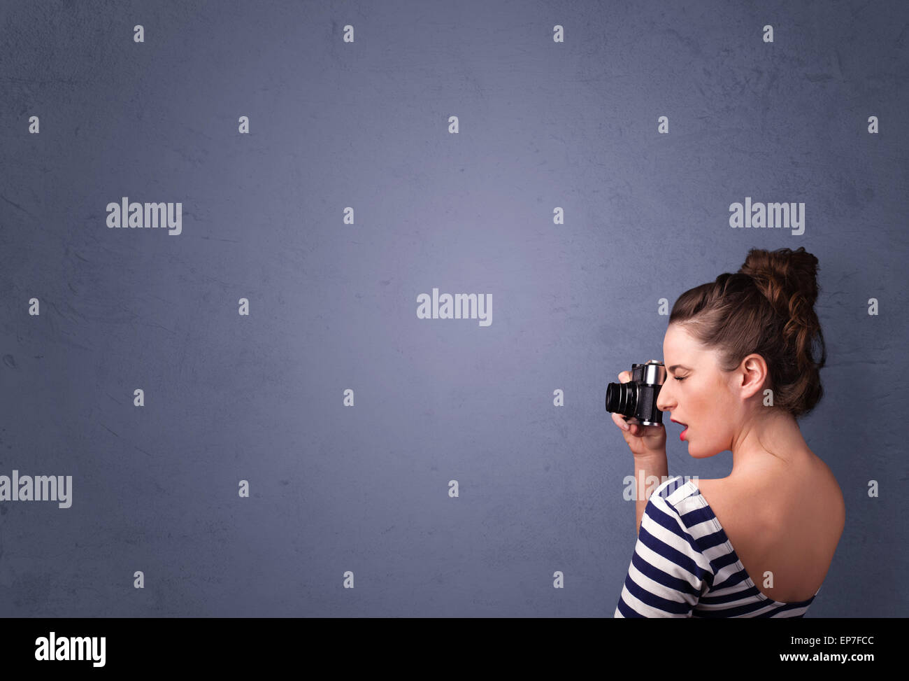 Photographer shooting images with copyspace area Stock Photo - Alamy