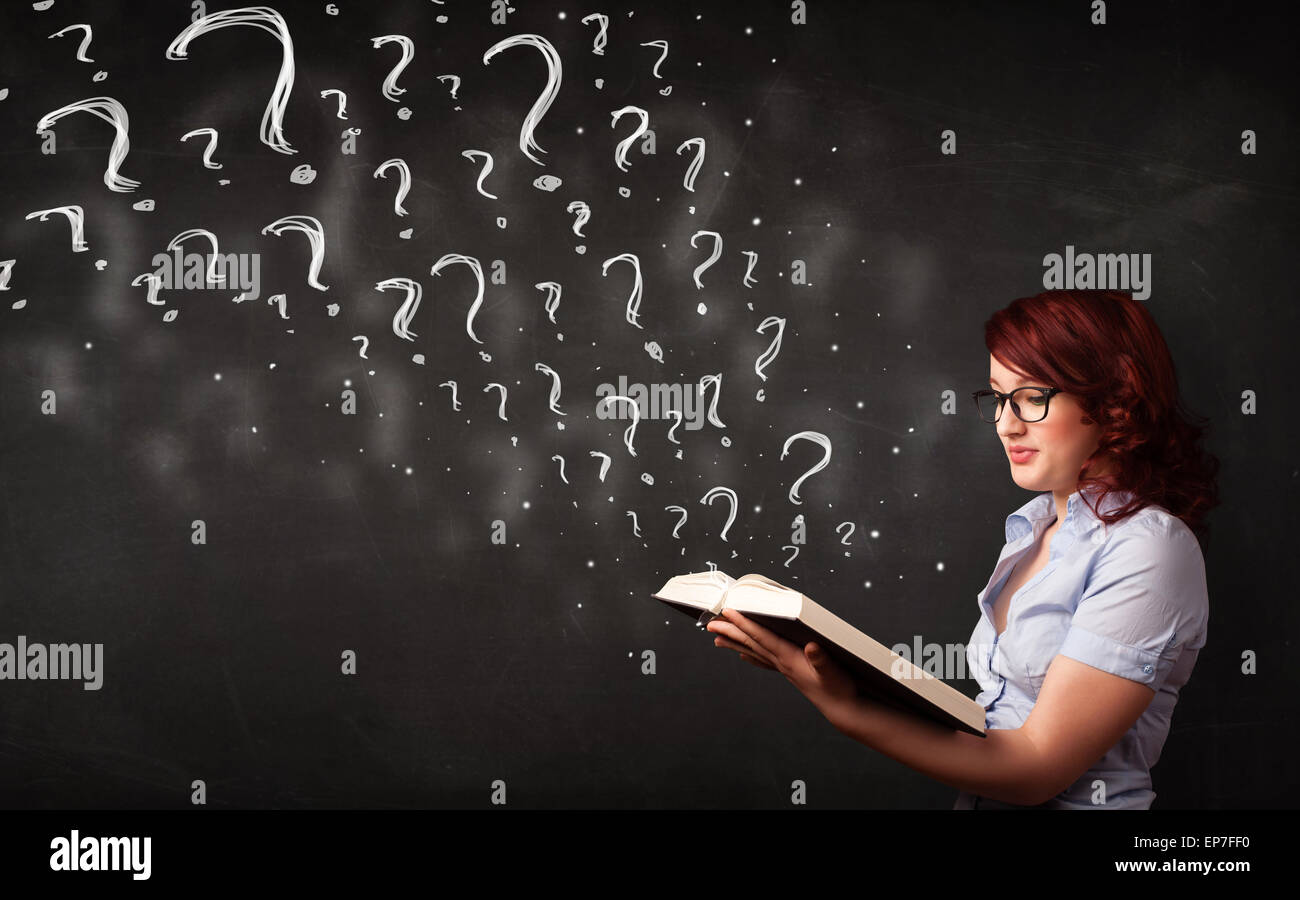 Pretty woman reading a book with question marks coming out from it ...