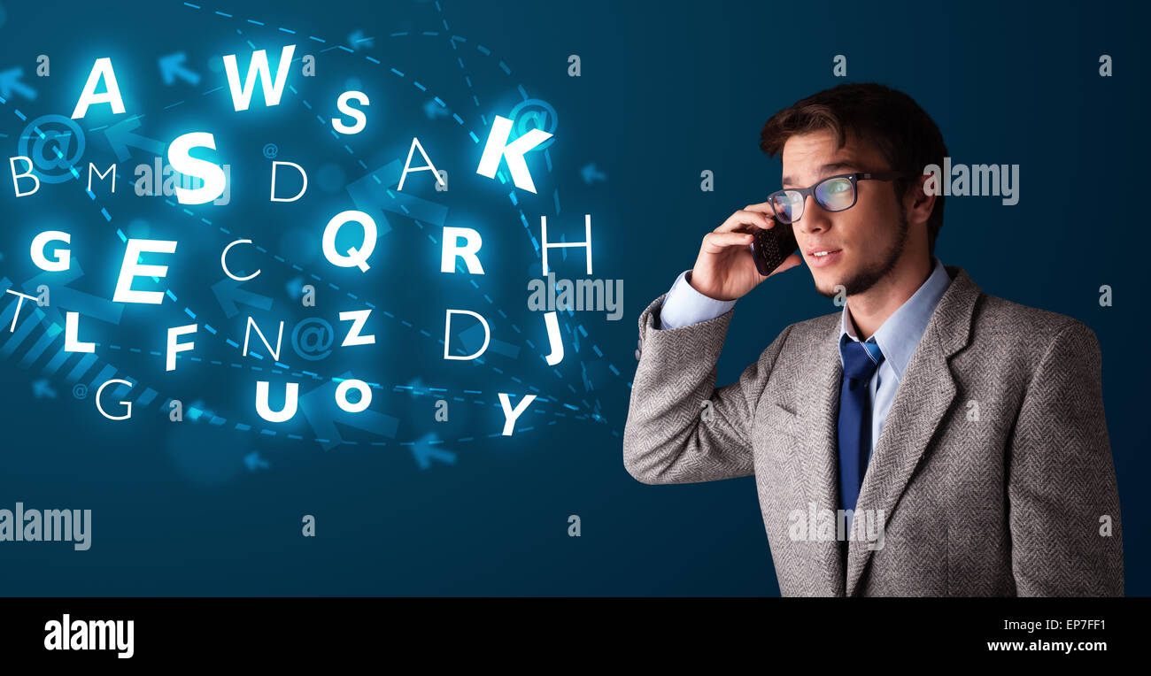 Young boy making phone call with shiny characters Stock Photo - Alamy