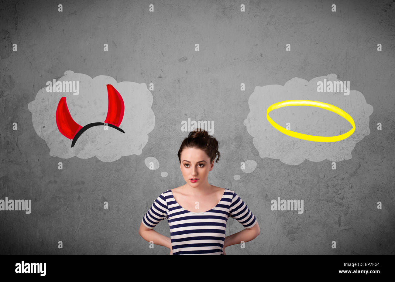 Woman choosing between good and bad Stock Photo - Alamy