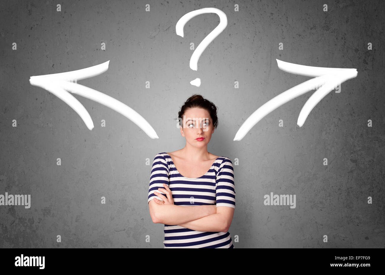 Young woman taking a decision Stock Photo - Alamy
