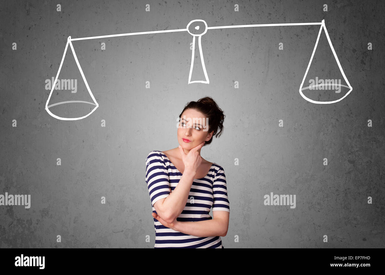Young woman taking a decision Stock Photo - Alamy