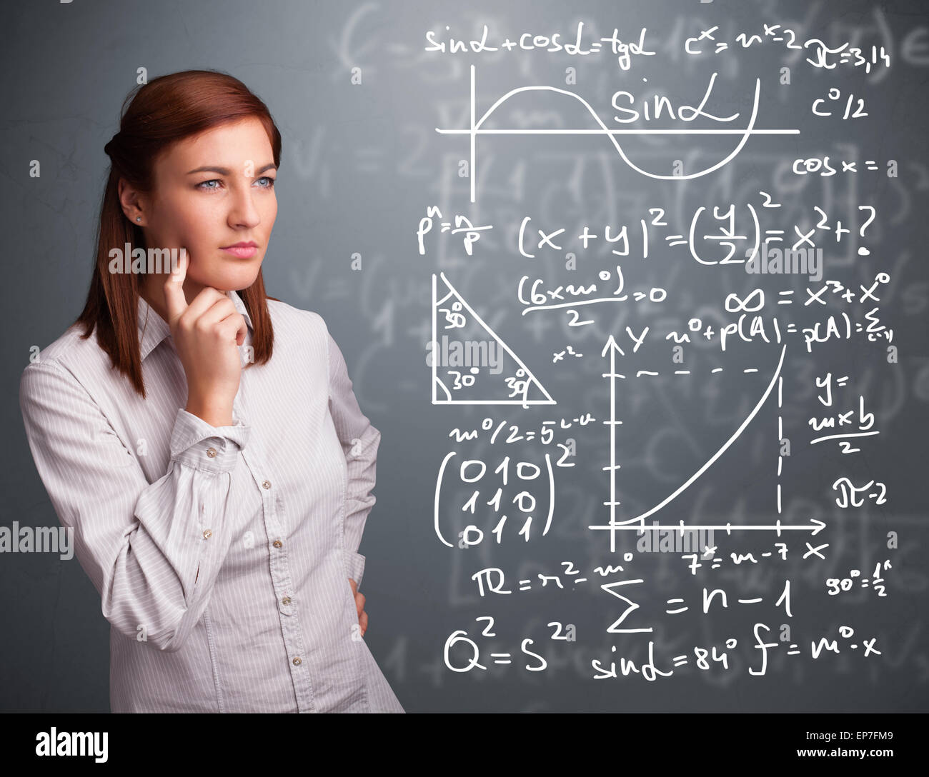 Beautiful school girl thinking about complex mathematical signs Stock ...