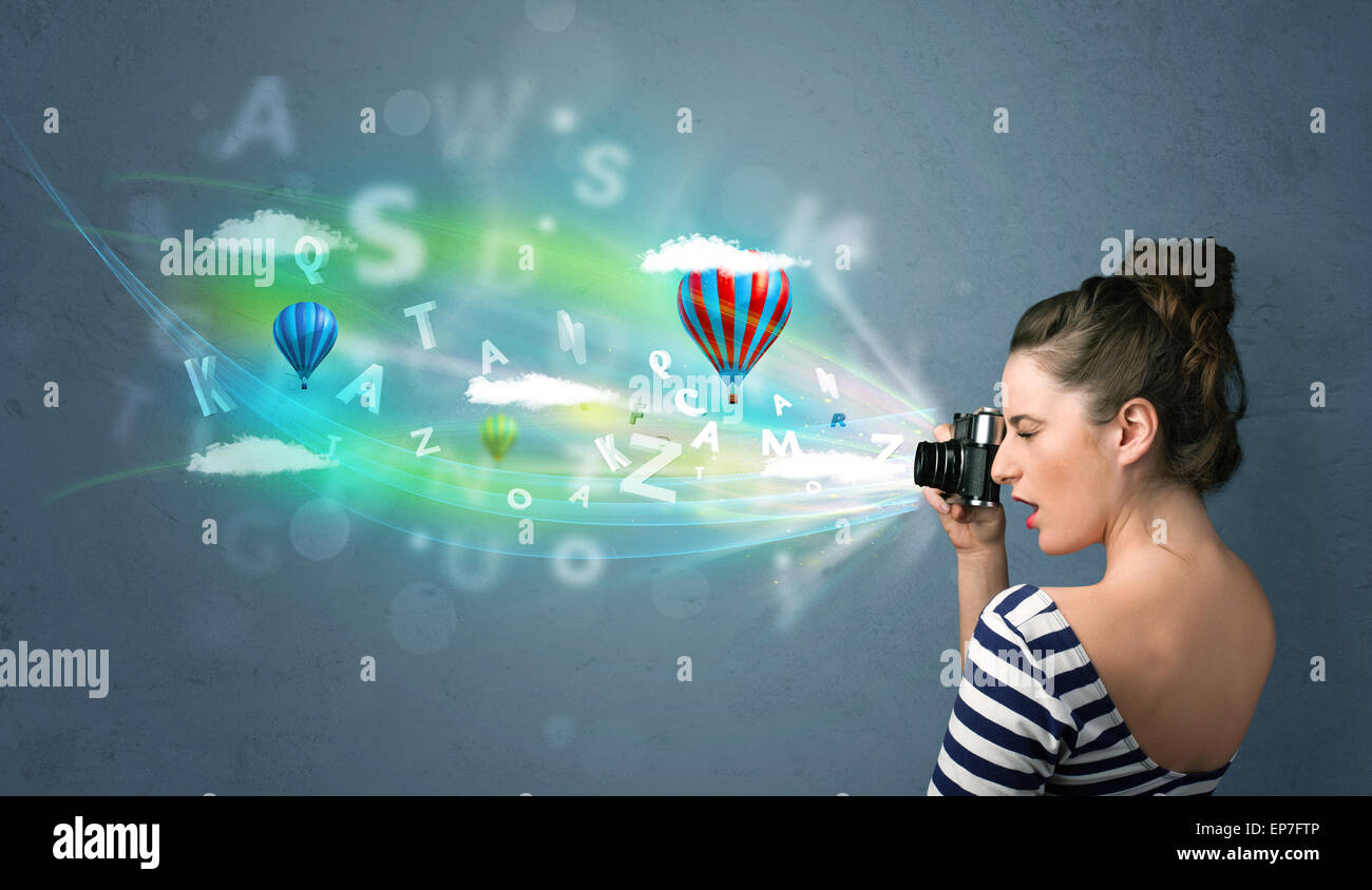 Photographer with camera and abstract imaginary Stock Photo - Alamy