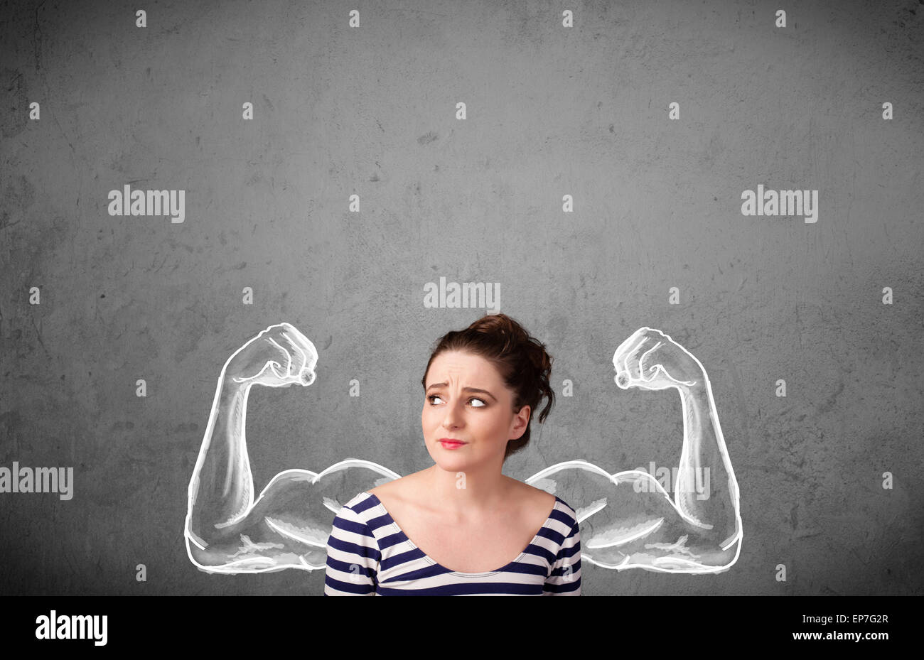 Young woman with strong muscled arms Stock Photo - Alamy