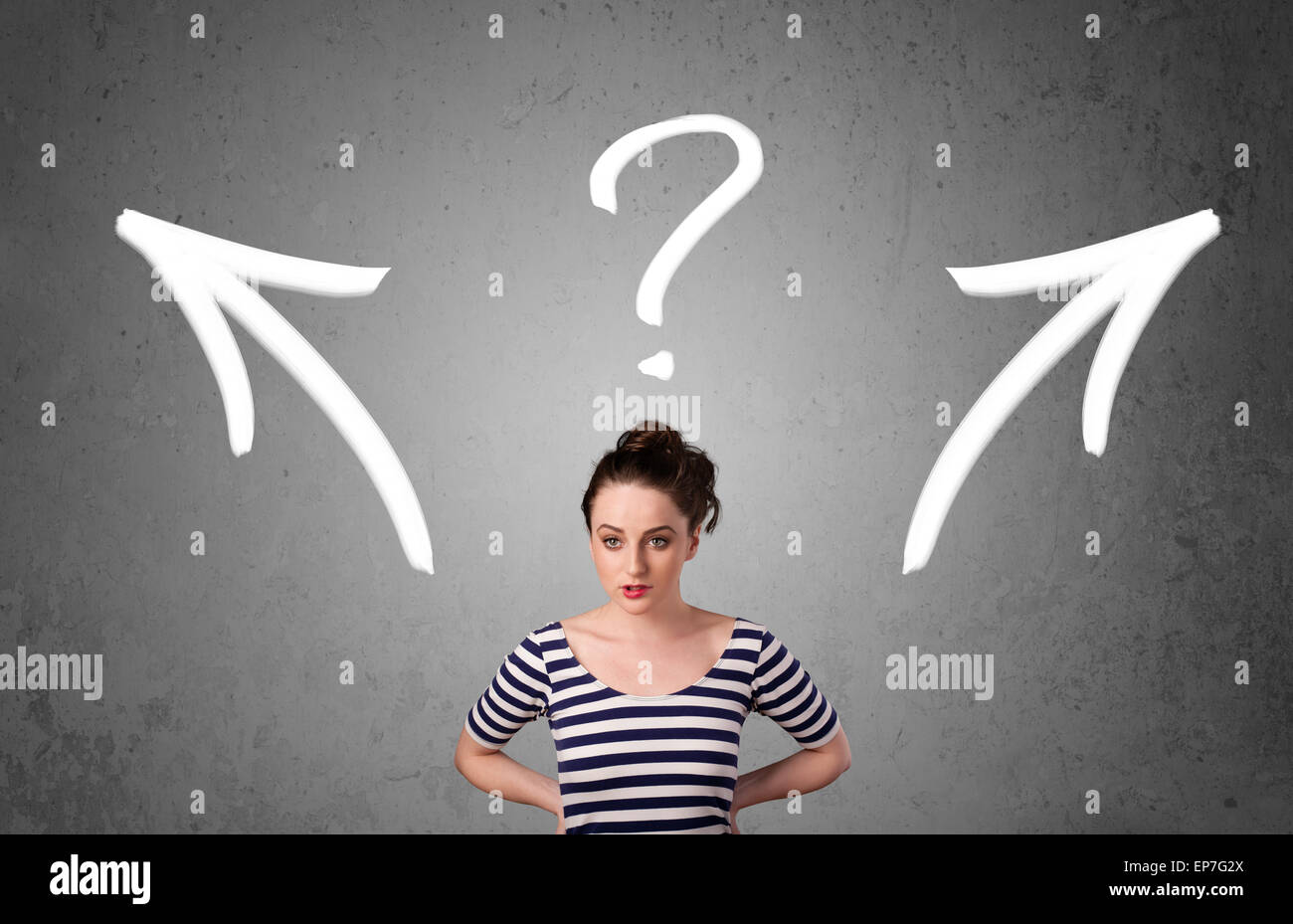 Young woman taking a decision Stock Photo - Alamy
