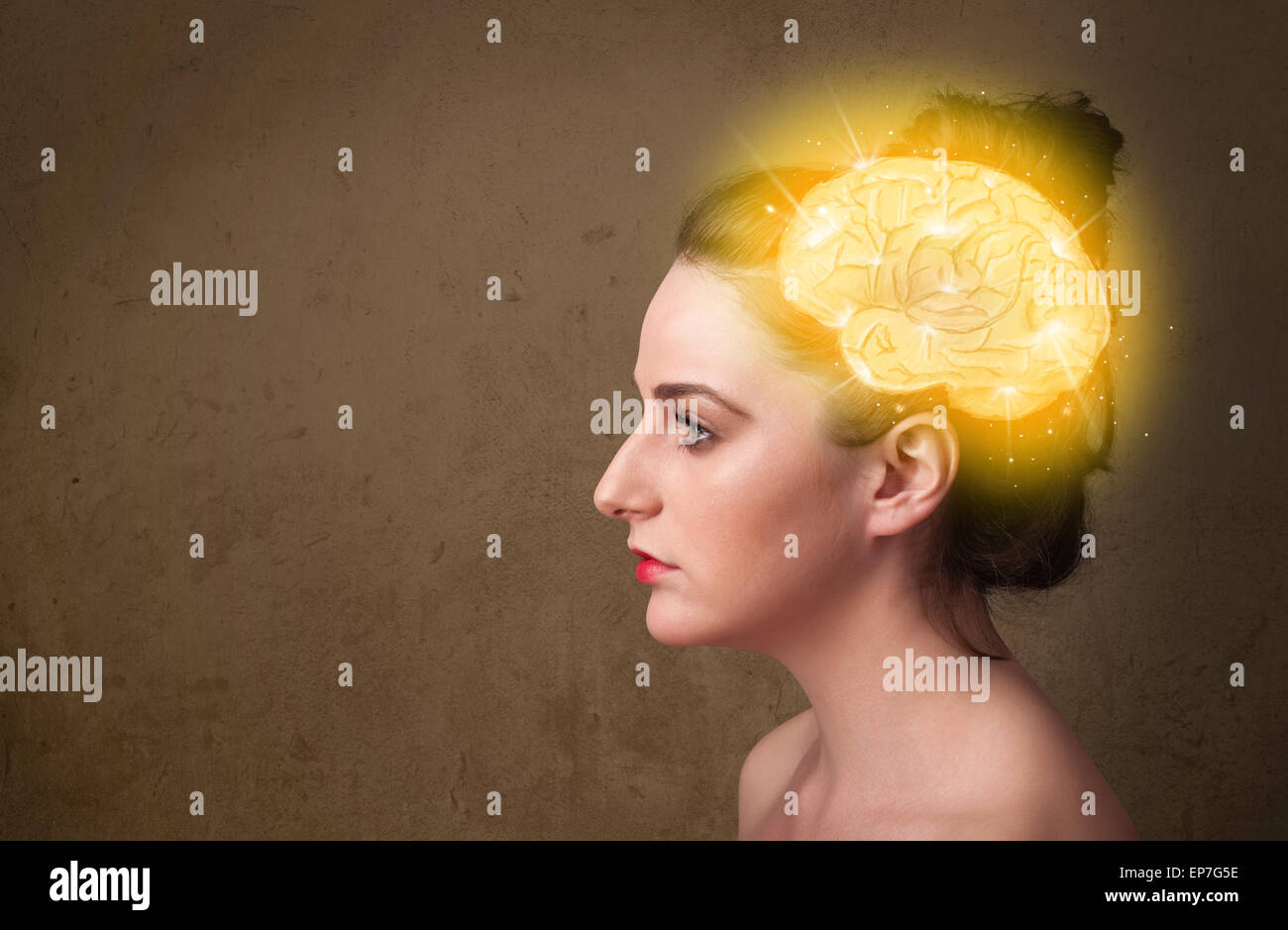 Young girl thinking with glowing brain illustration Stock Photo - Alamy