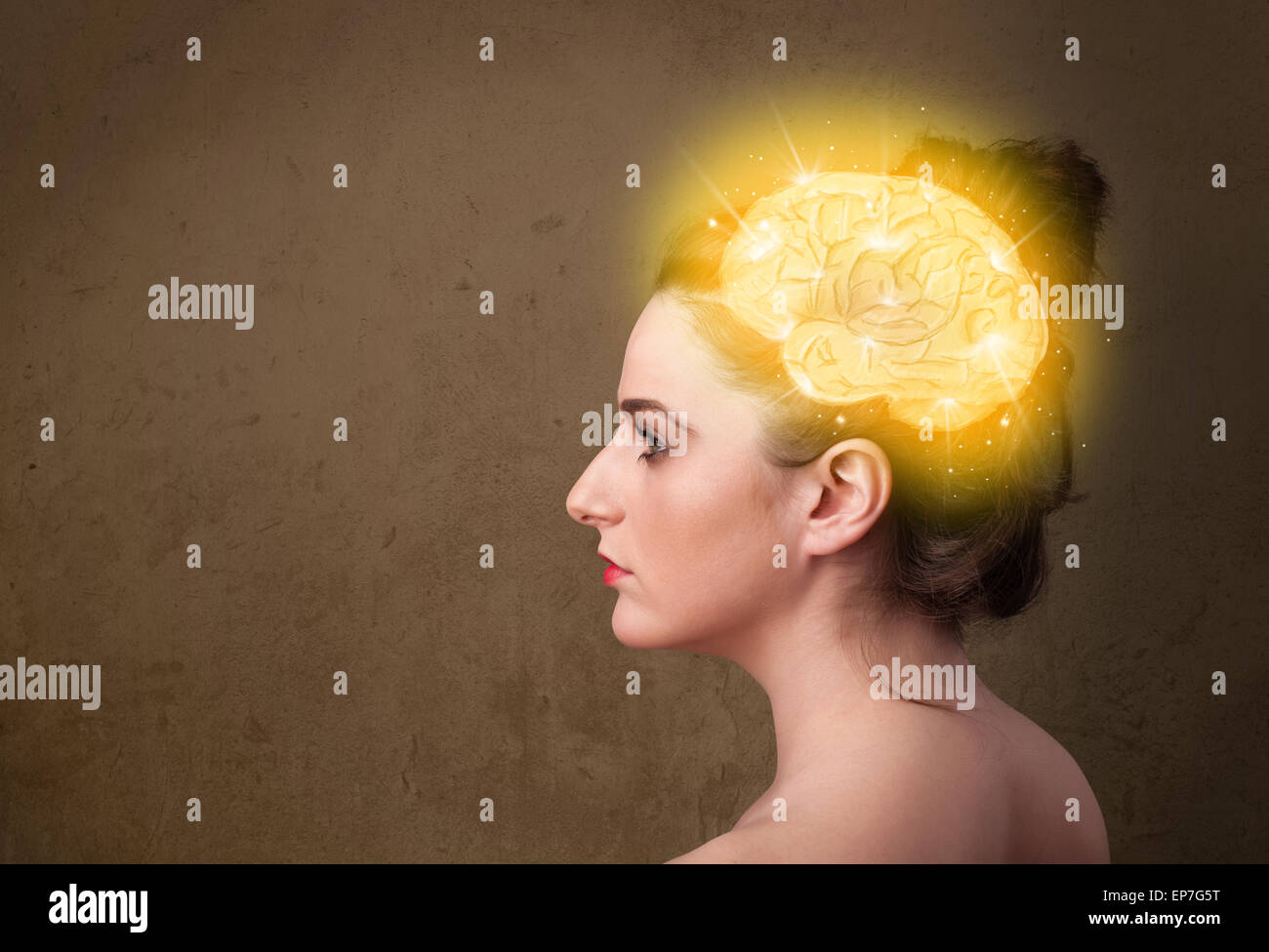 Young girl thinking with glowing brain illustration Stock Photo - Alamy