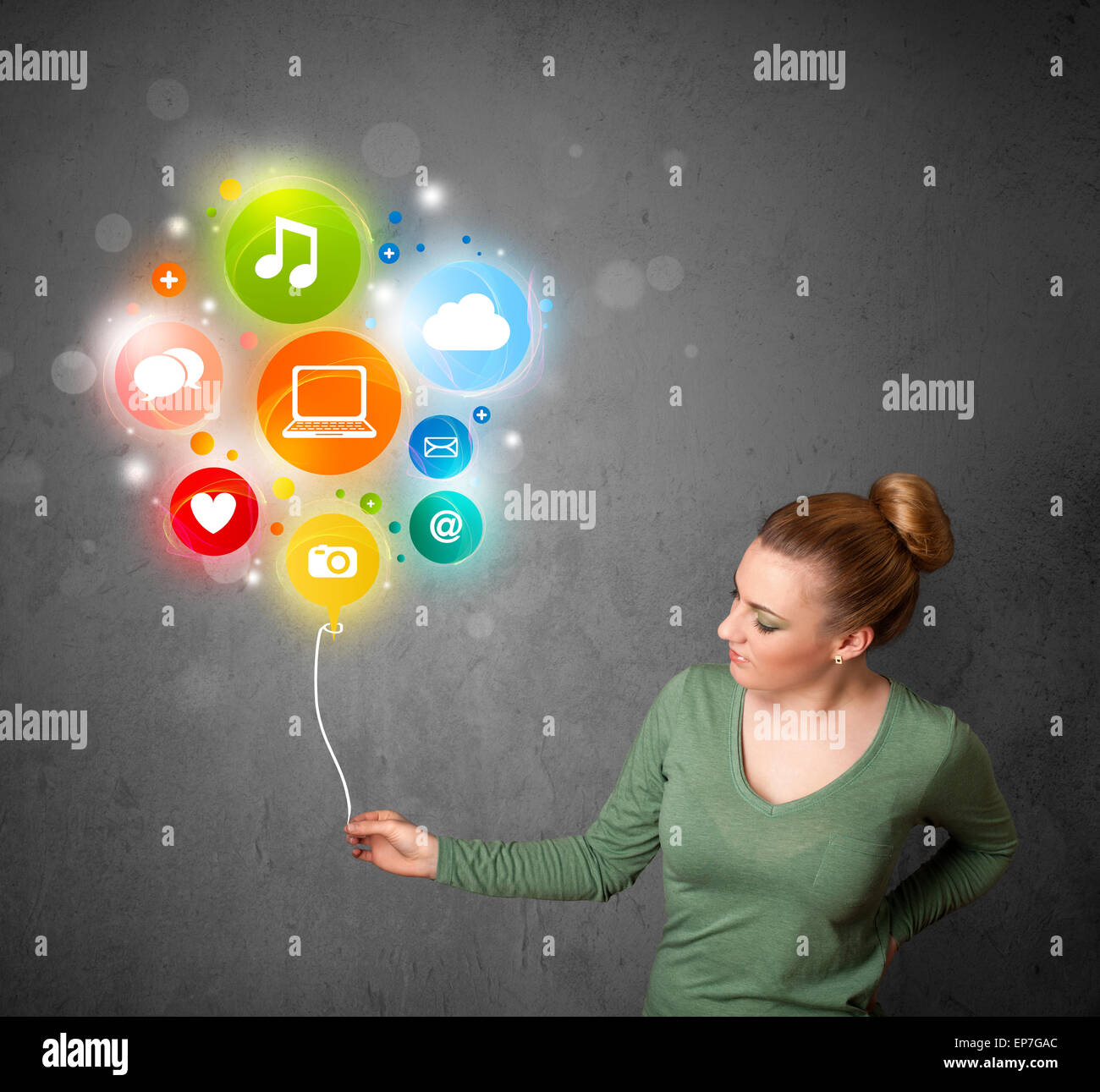 Woman holding social media balloon Stock Photo - Alamy