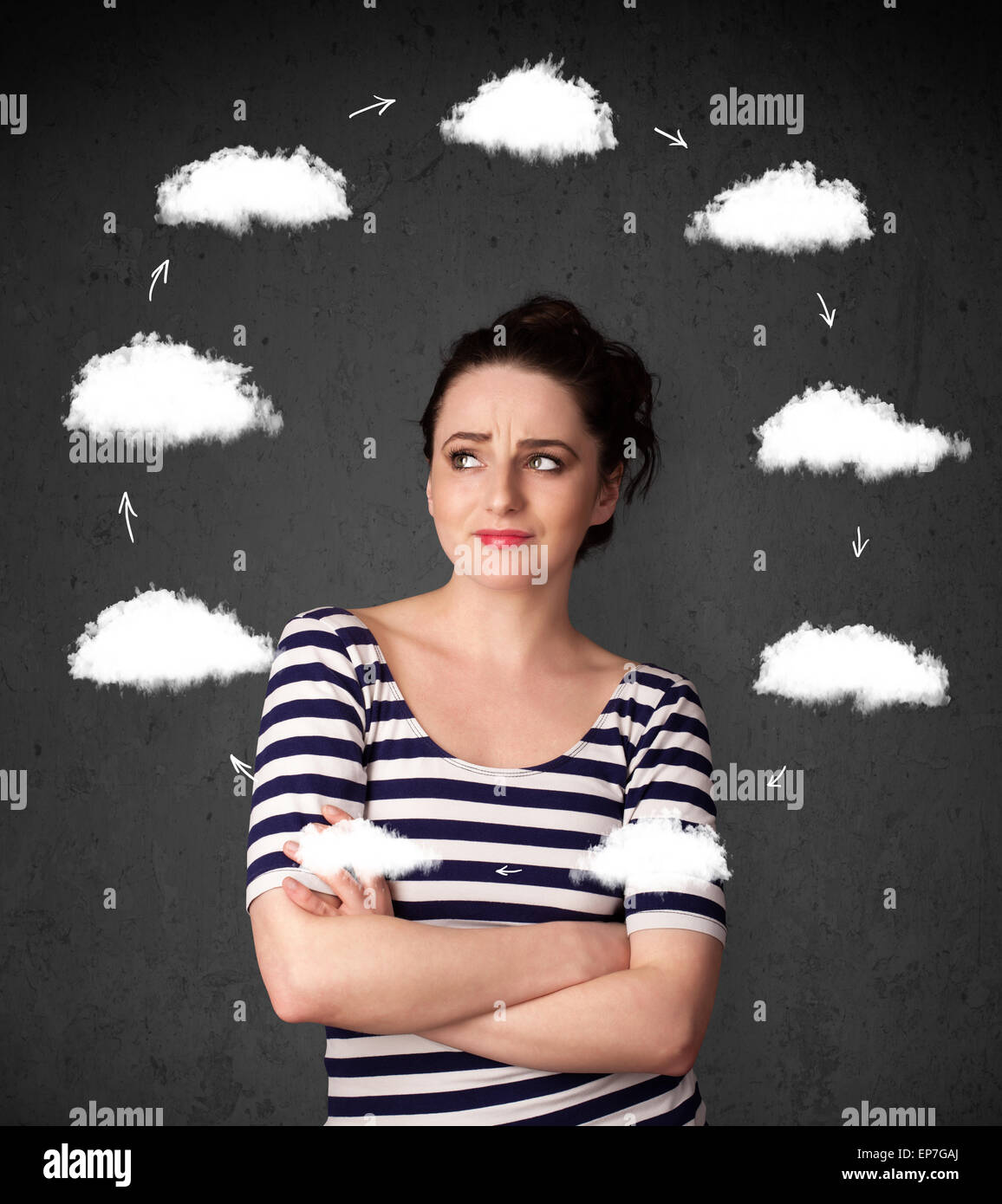 Young woman thinking with cloud circulation around her head Stock Photo ...