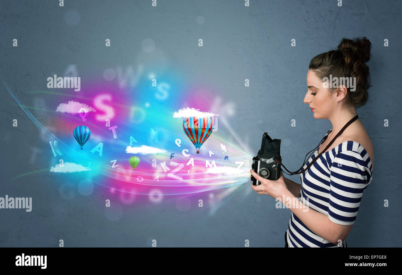 Photographer with camera and abstract imaginary Stock Photo - Alamy