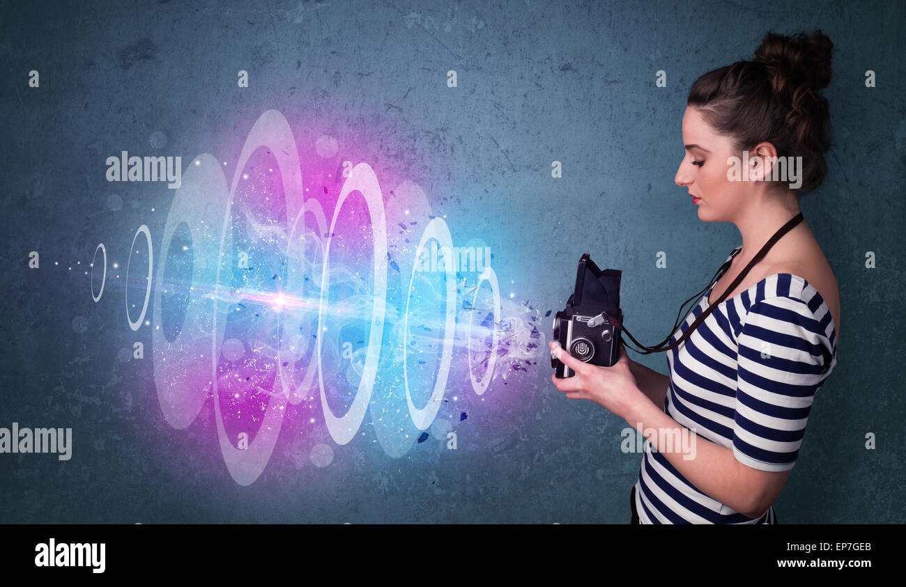 Photographer girl making photos with powerful light beam Stock Photo ...