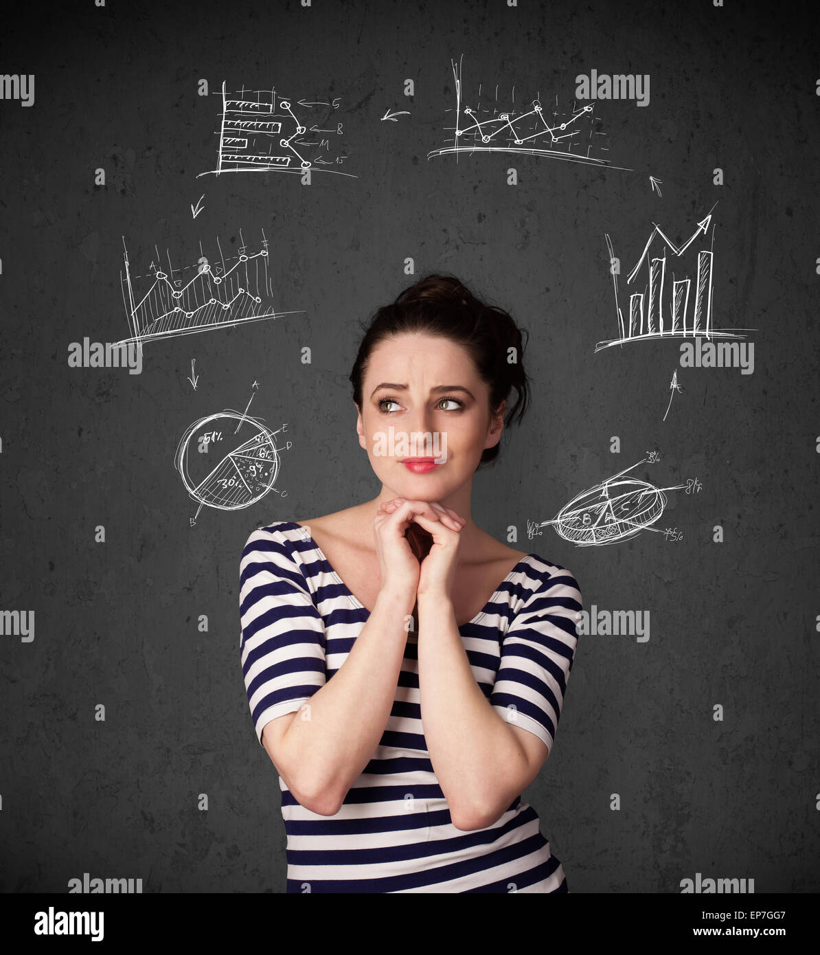 Young woman thinking with charts circulation around her head Stock ...