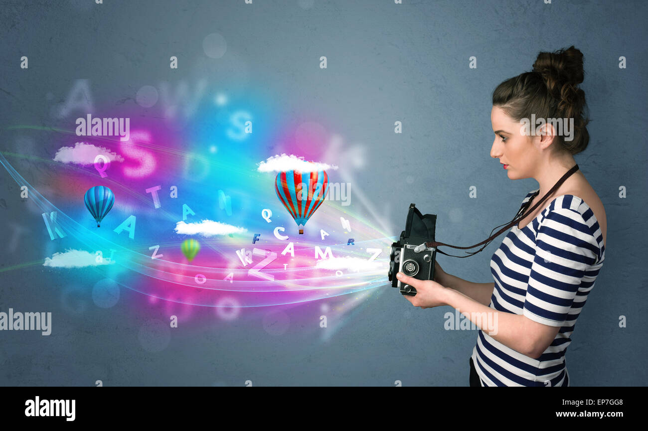 Photographer with camera and abstract imaginary Stock Photo - Alamy