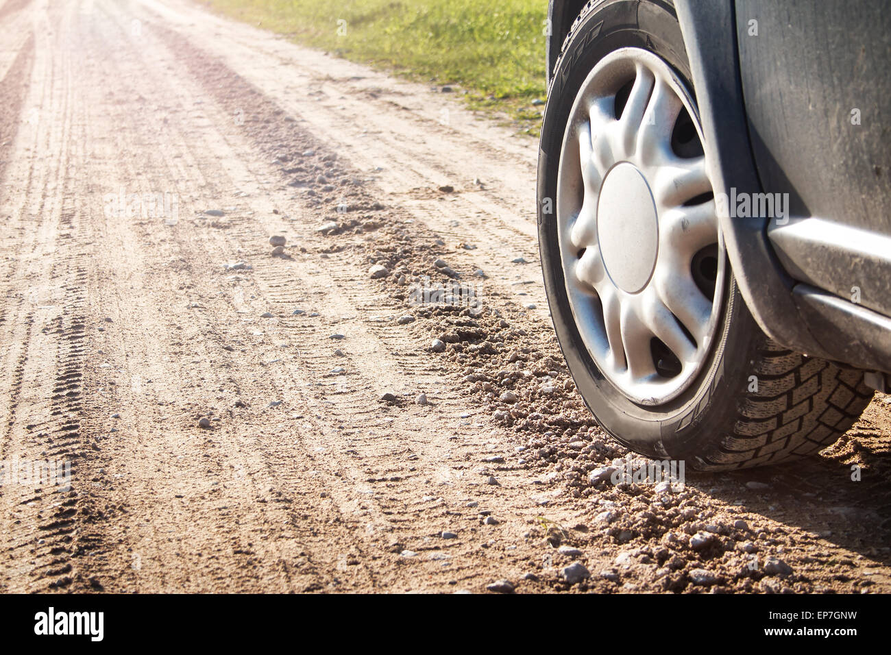 car tire on dirt road Stock Photo - Alamy