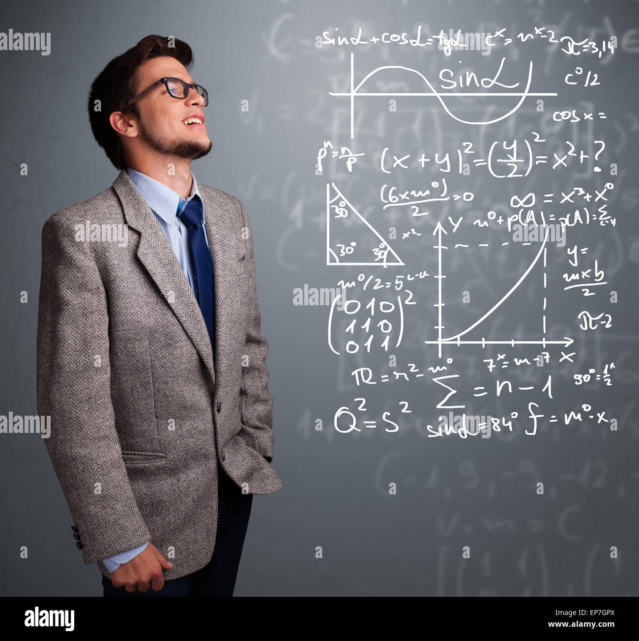 Handsome school boy thinking about complex mathematical signs Stock ...