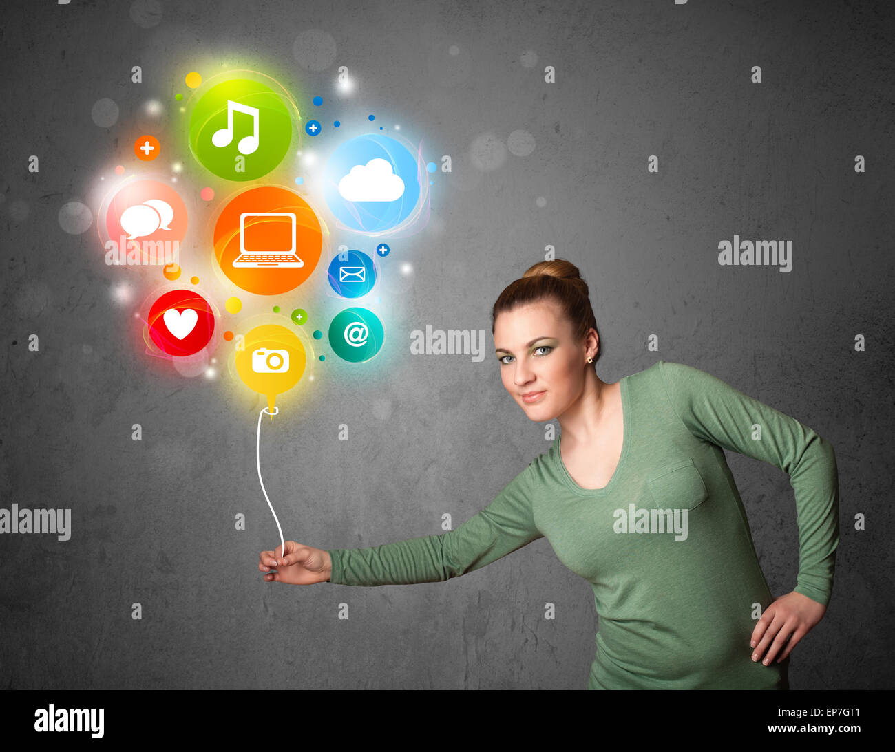 Woman holding social media balloon Stock Photo - Alamy