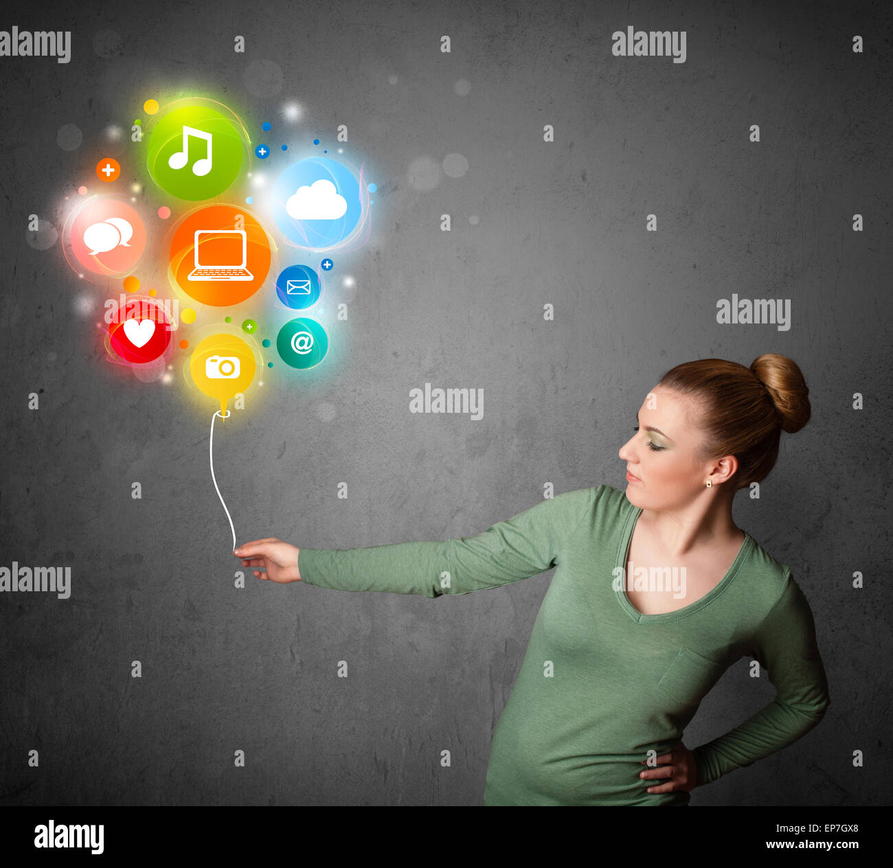 Woman holding social media balloon Stock Photo - Alamy