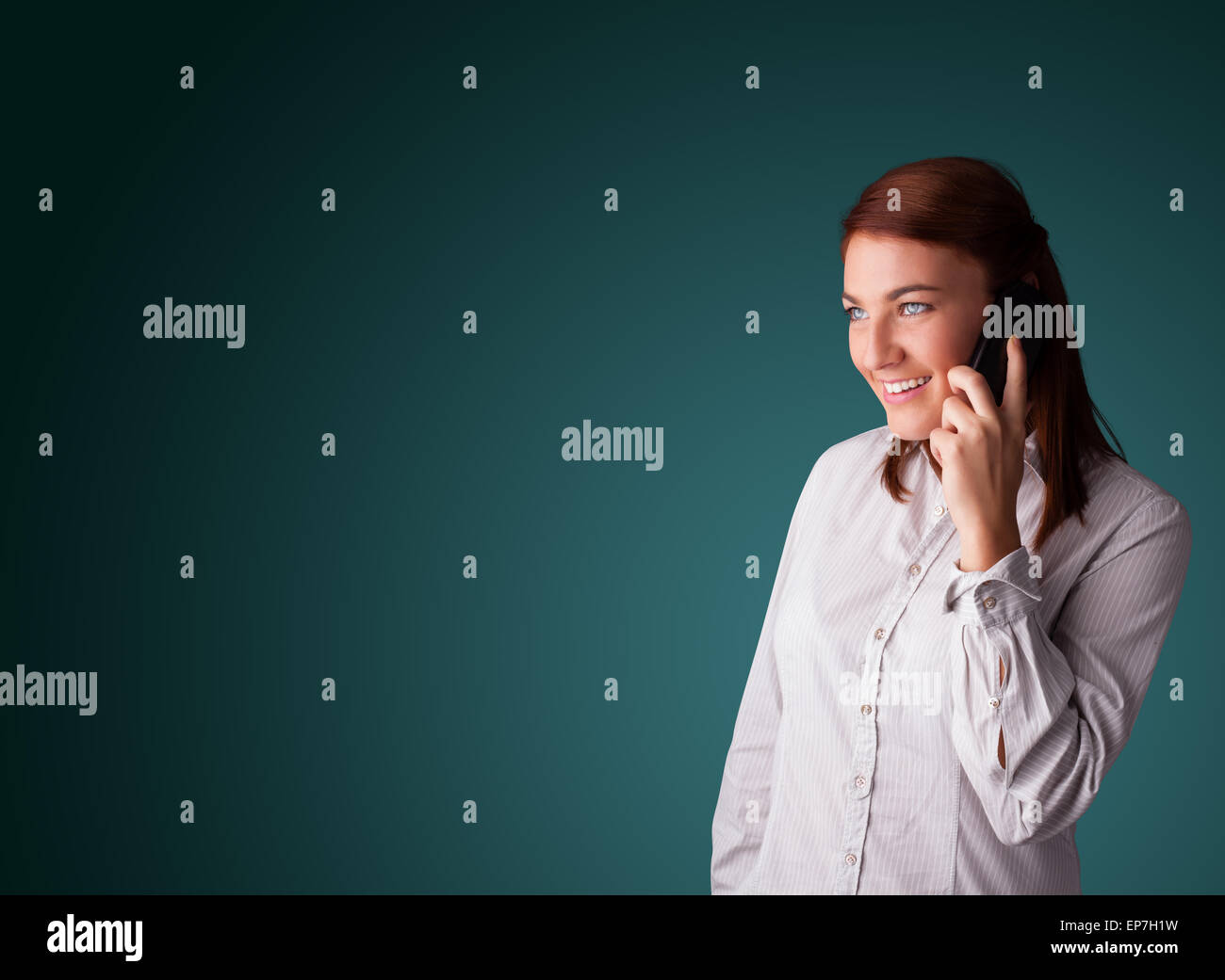 Young woman making phone call with copy space Stock Photo - Alamy