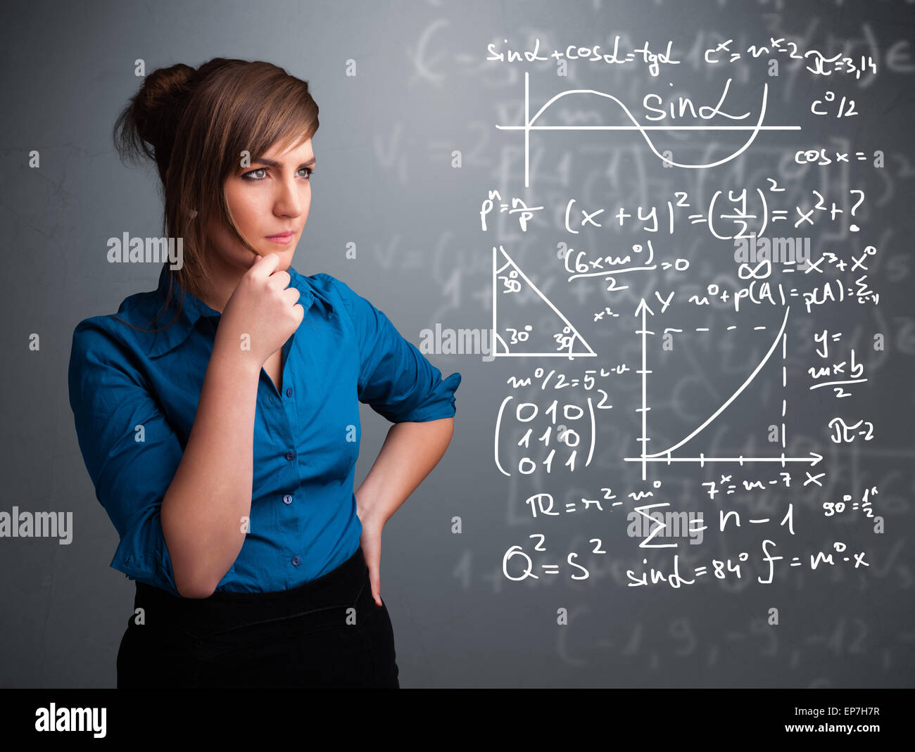 Beautiful school girl thinking about complex mathematical signs Stock ...