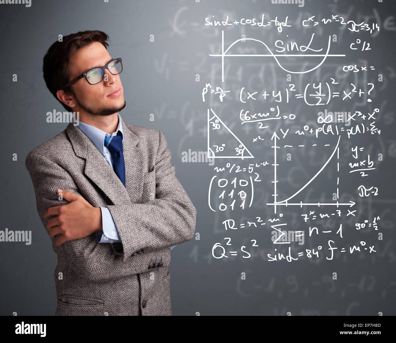 Handsome school boy thinking about complex mathematical signs Stock ...