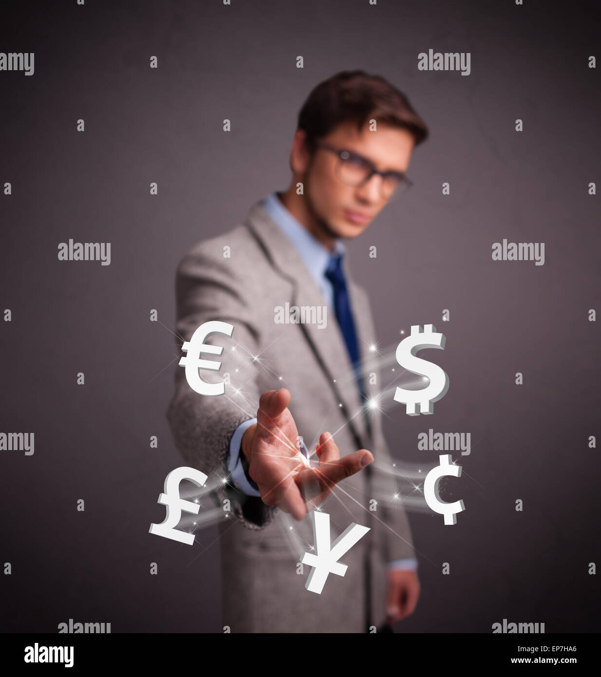 Attractive man throwing currency icons Stock Photo - Alamy