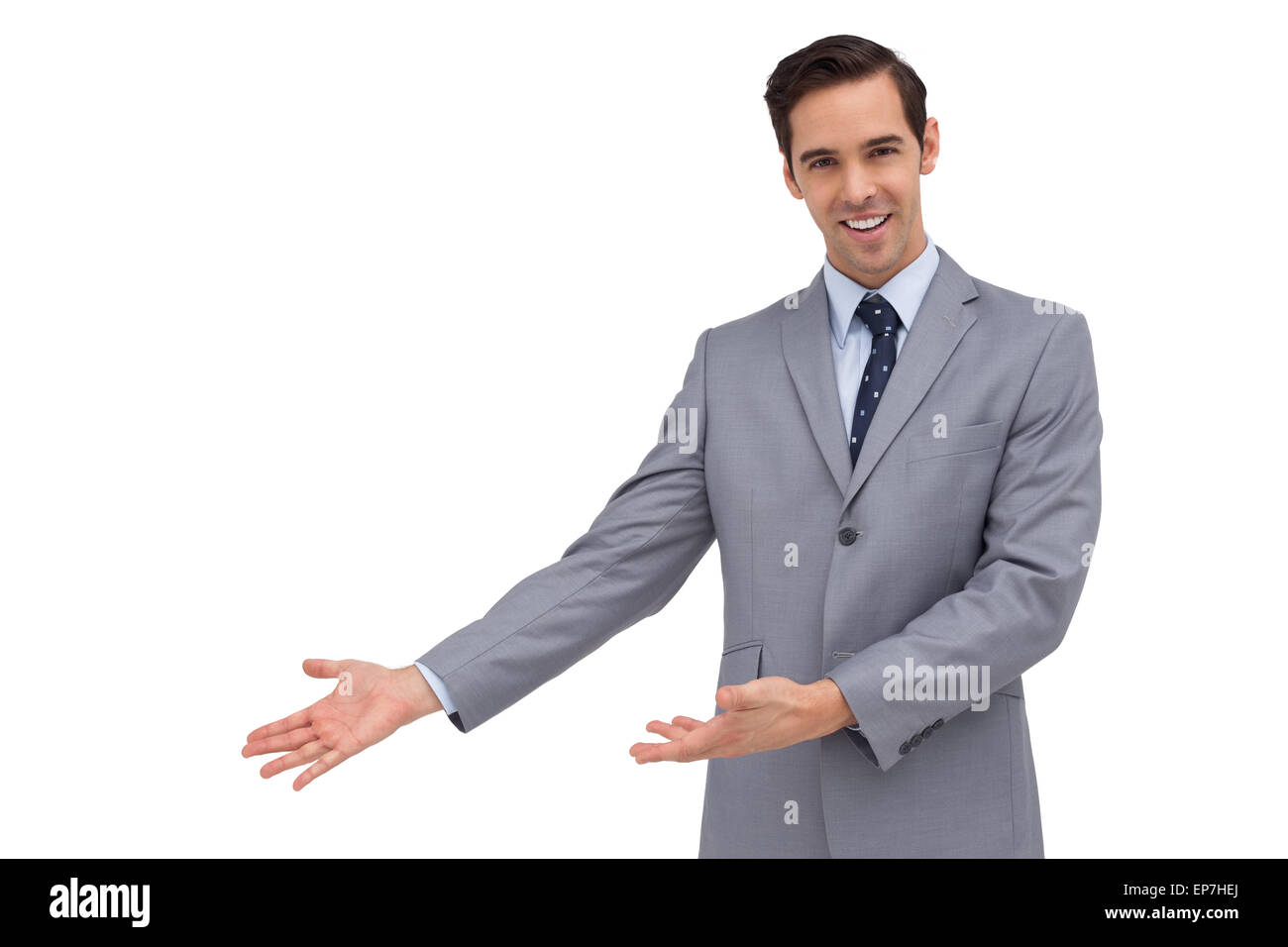 Smiling businessman giving a presentation with his hands Stock Photo ...