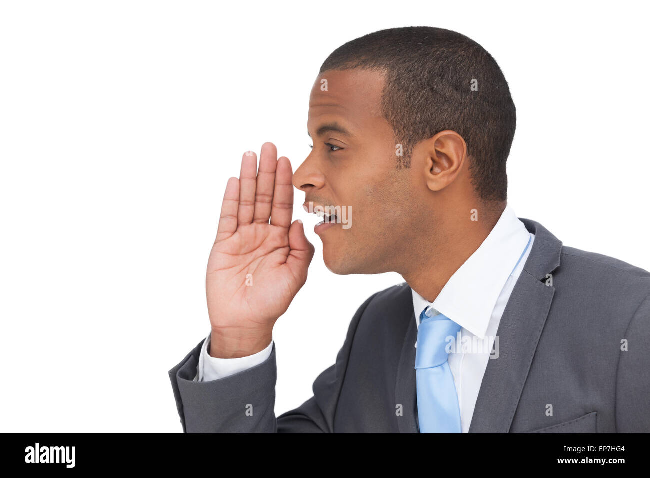 Profile view of a businessman calling for someone Stock Photo - Alamy