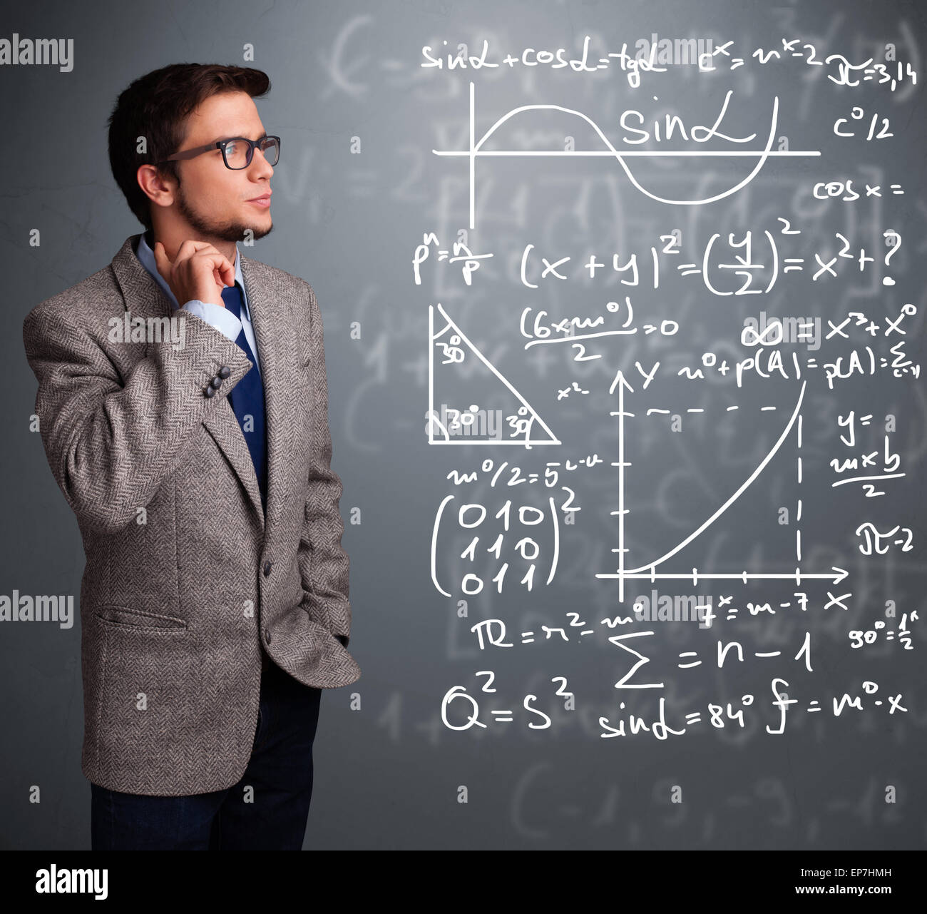 Handsome school boy thinking about complex mathematical signs Stock ...