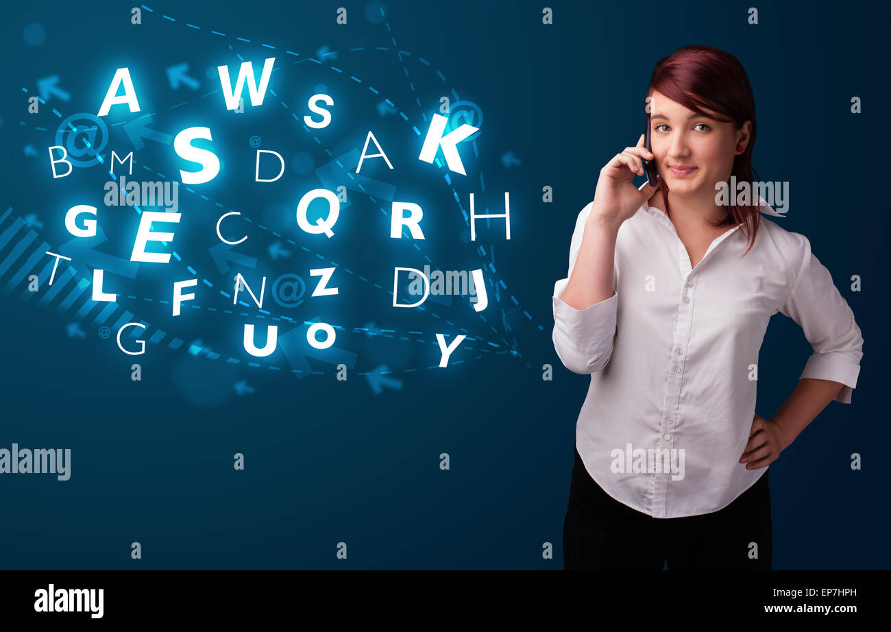 Young lady making phone call with shiny characters Stock Photo - Alamy