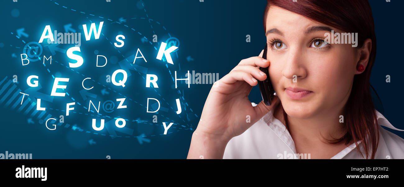 Young lady making phone call with shiny characters Stock Photo - Alamy