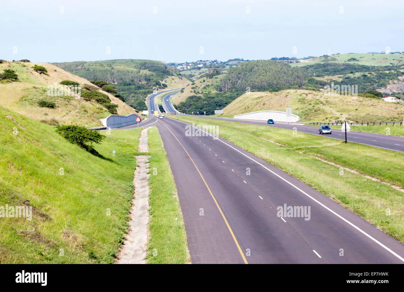 double lane highway with off ramp and on ramp Stock Photo - Alamy